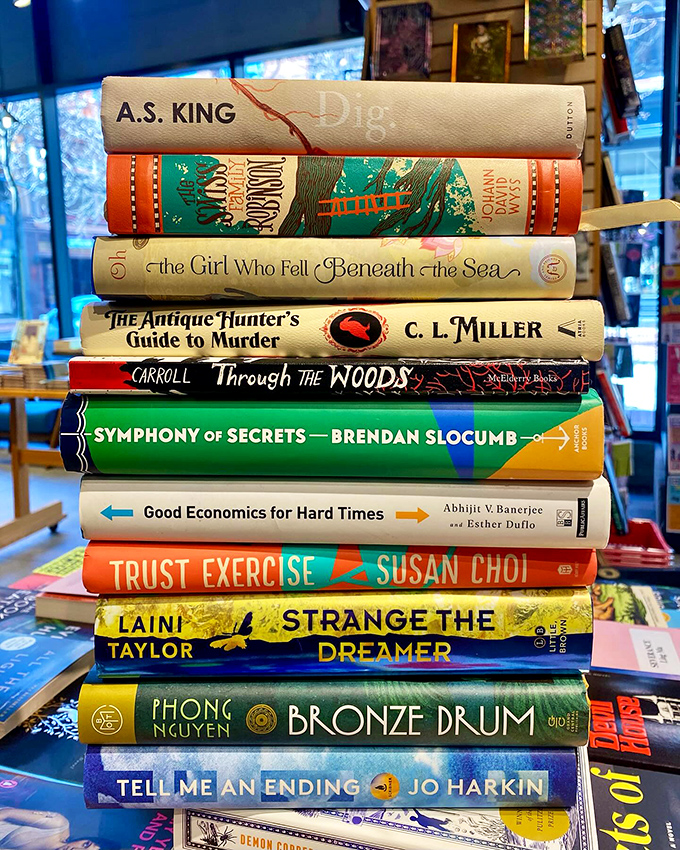 A tower of tales waiting to be discovered! Like a literary Jenga, each book adds to the precarious balance of your to-read list.