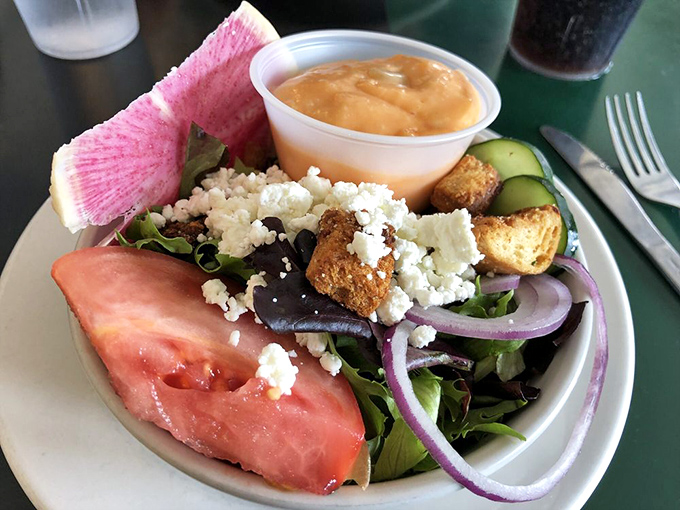 Who said salads can't be fun? This colorful ensemble is like a garden party in a bowl, complete with VIP watermelon.