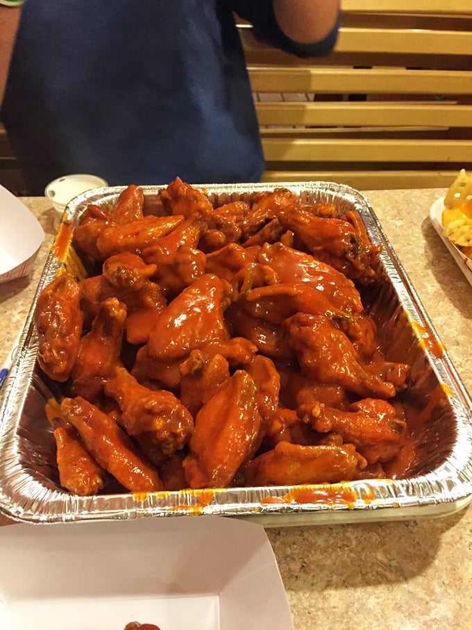 Wing-tastic voyage! This tray of saucy goodness is like a cruise ship buffet, but with 100% more napkin usage.