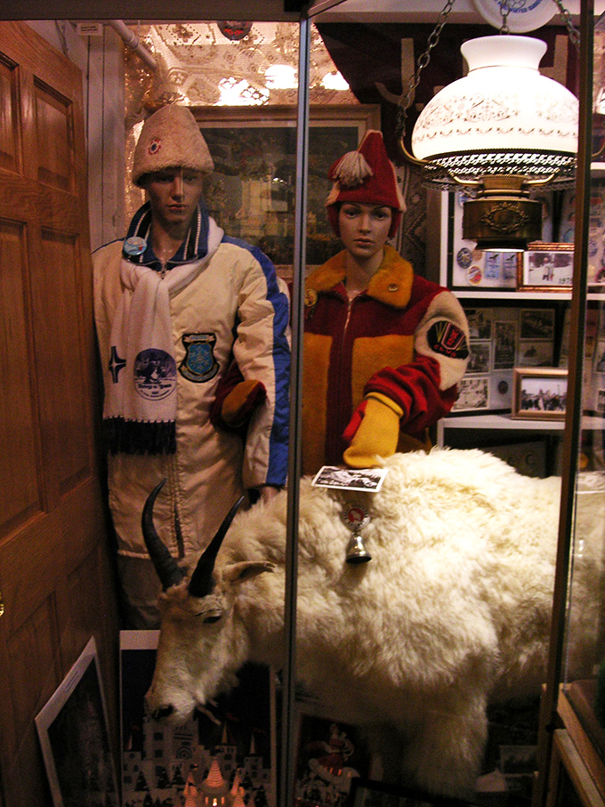 Talk about the ultimate staring contest! These stoic statues seem to be silently judging your fashion choices from their glass case vantage point.