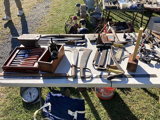 Tools with wooden handles and honest patina. Each hammer and wrench represents a thousand problems solved by hands now long retired.