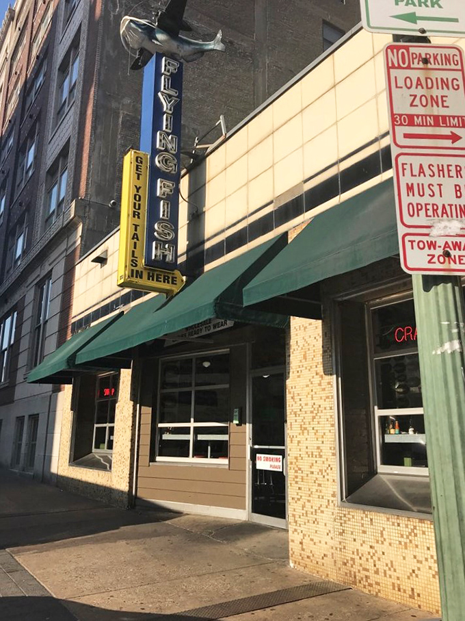 Flying Fish: Where seafood takes flight in Memphis. That sign is the Batman signal for hungry fish lovers!