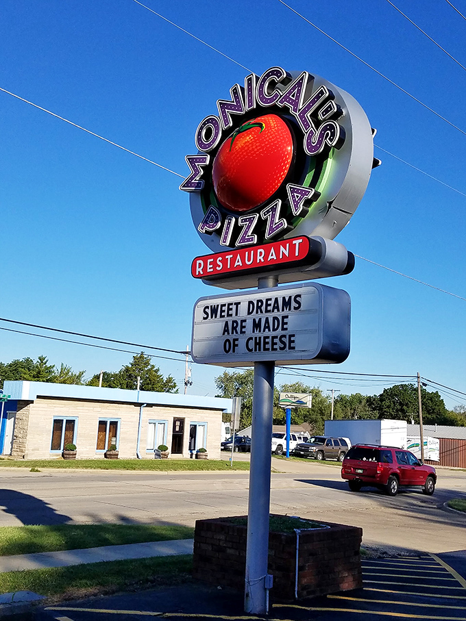 Monical's Pizza: Where that big red tomato sign isn't just a logo, it's a beacon of hope for the hungry. It's pizza with a side of deja vu.