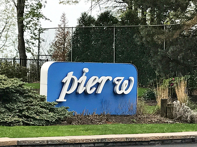 Pier W: Where architecture meets seafood in perfect harmony. It's like dining on a ship... that happens to be perched on a cliff!