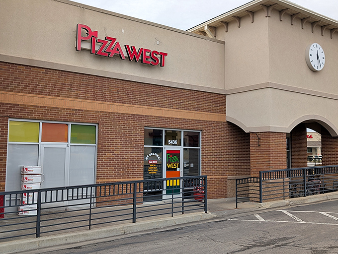 Pizza West's modern storefront houses old-school pizza values in this Shawnee shopping center.