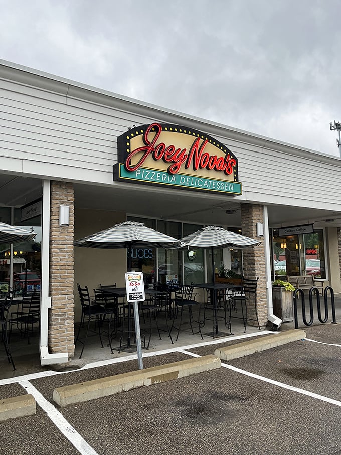 Joey Nova's inviting patio: White umbrellas stand guard over pizza paradise. It's your new favorite outdoor dining room, complete with cheese pull potential.