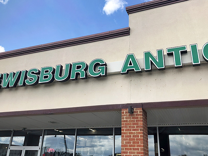 The green lettering against cream-colored stucco isn't just signage&mdash;it's a portal to Pennsylvania's past. Welcome to treasure-hunting headquarters.