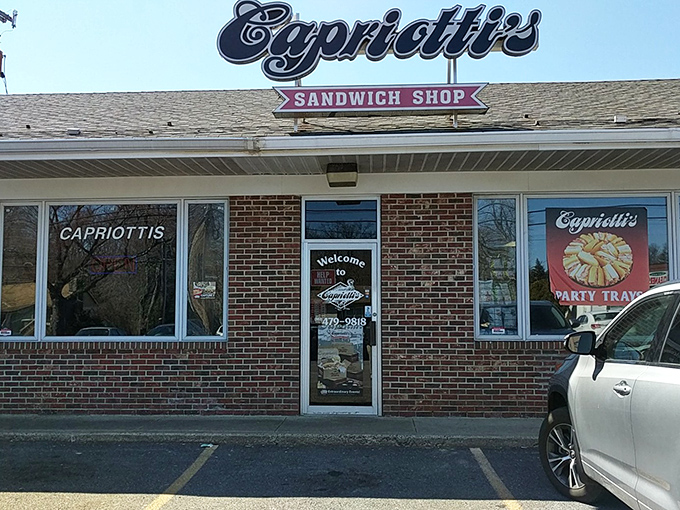 The iconic Capriotti's sign beckons sandwich pilgrims like a neon North Star. Delaware's brick-and-mortar temple to the art of sandwich-making.