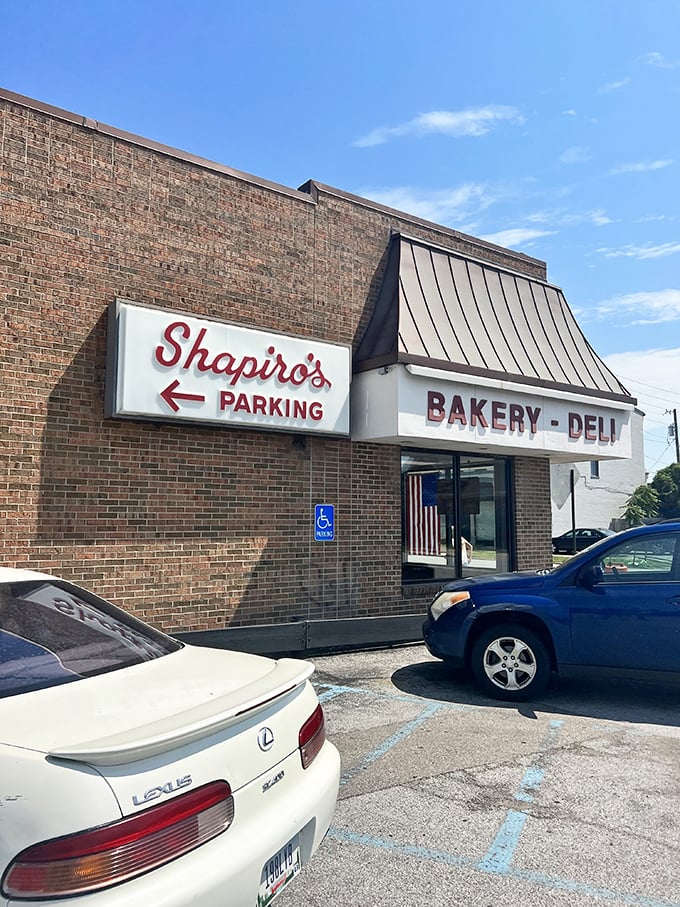 The iconic red Shapiro's sign beckons like a lighthouse for the sandwich-starved. This brick-faced beacon has guided hungry Hoosiers to deli nirvana for generations.