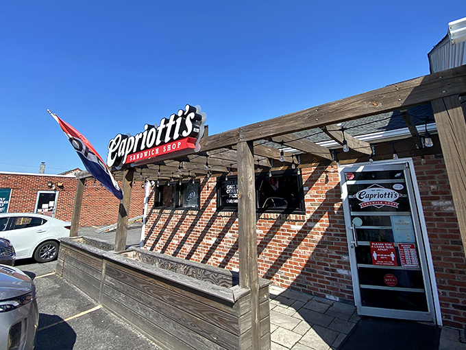 The iconic Capriotti's sign beckons sandwich pilgrims like a neon North Star. Delaware's brick-and-mortar temple to the art of sandwich-making.