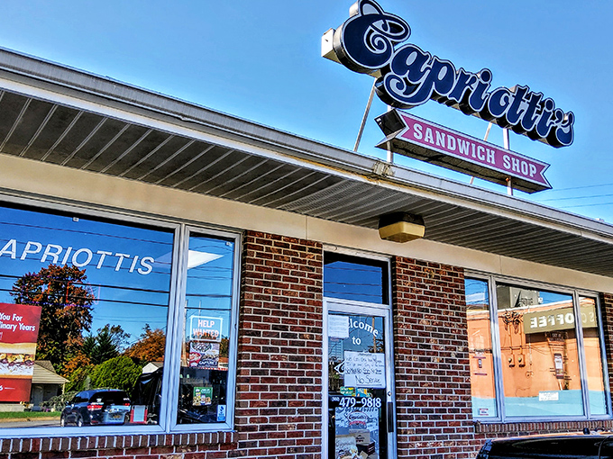 The iconic Capriotti's sign beckons sandwich pilgrims like a neon North Star. Delaware's brick-and-mortar temple to the art of sandwich-making.