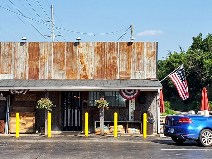 The weathered exterior of Rusted Silo isn't just authentic&mdash;it's a time machine disguised as a barbecue joint. Those yellow posts aren't just practical; they're exclamation points announcing culinary treasure.