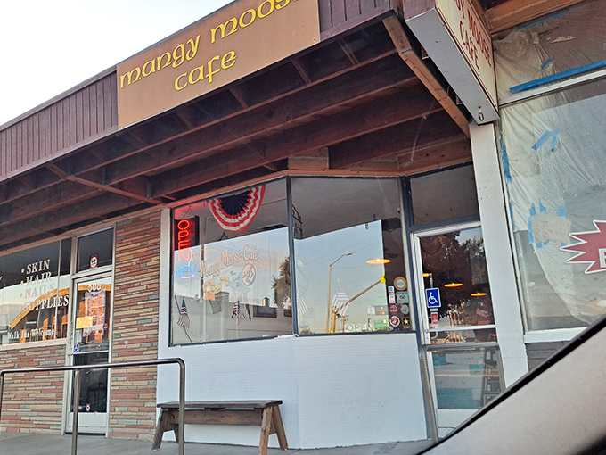 The humble yellow lettering against weathered wood says it all &ndash; great breakfasts don't need fancy facades, just like the best stories come from unexpected places.