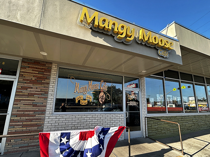 The humble yellow lettering against weathered wood says it all &ndash; great breakfasts don't need fancy facades, just like the best stories come from unexpected places.