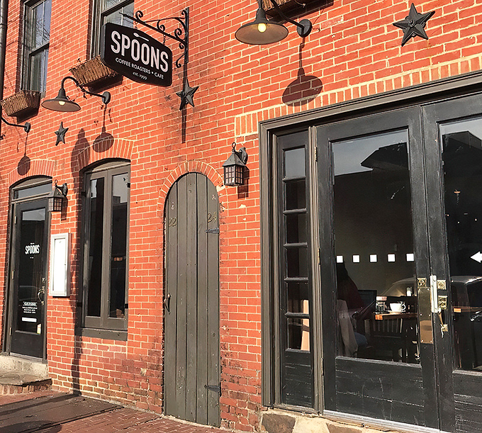Spoons' classic brick exterior with its understated sign promises culinary treasures within. Federal Hill's breakfast landmark has been drawing crowds since 1999.