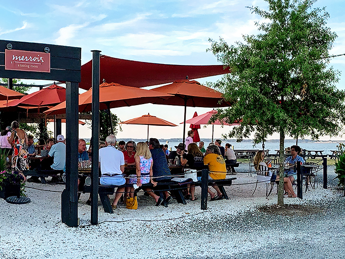 The entrance to seafood paradise - a humble wooden structure with bright orange awnings where Chesapeake Bay magic happens daily.