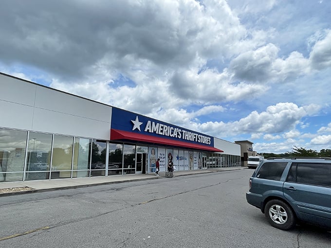 The red, white, and blue facade of America's Thrift Stores stands like a patriotic monument to bargain hunting. Treasure awaits inside!