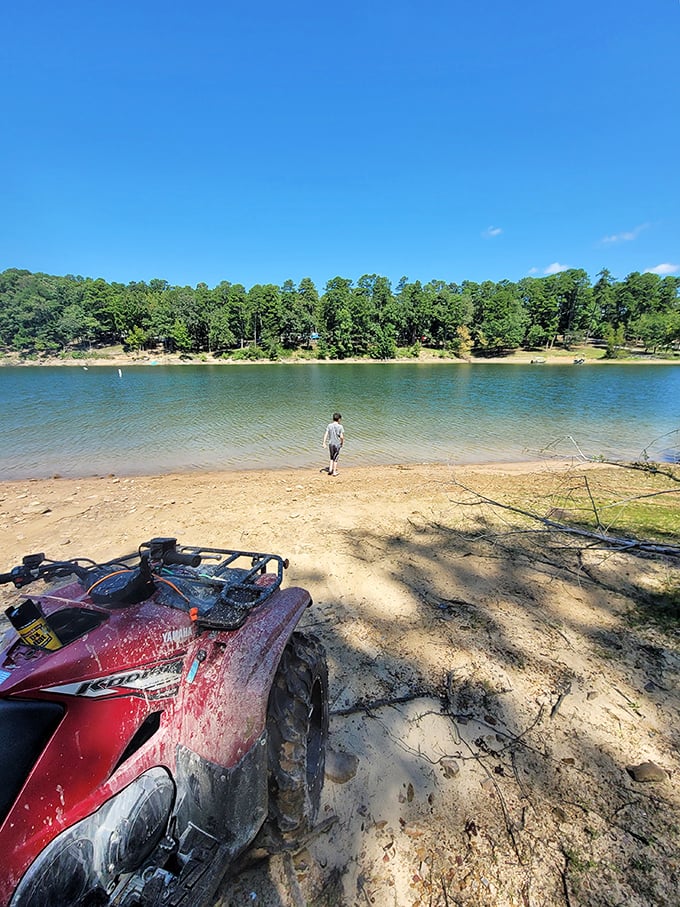 Lake Greeson's crystal waters beckon like nature's own infinity pool. Who needs a resort when Arkansas offers this waterfront serenity?