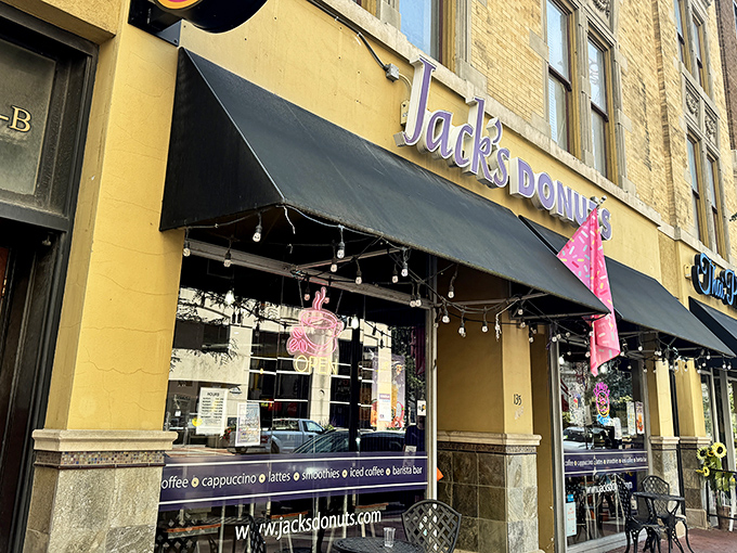 Jack's Donuts announces its presence with charming simplicity&mdash;a yellow brick building, black awning, and the promise of sweet satisfaction waiting inside.