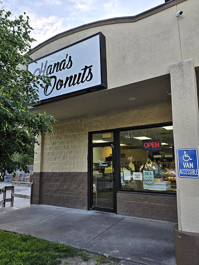 The unassuming storefront that houses Kansas City's donut nirvana. Like finding a treasure map in your attic, this sign promises delicious adventures ahead.