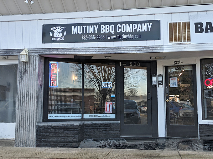 The unassuming storefront hides barbecue greatness like a poker player with four aces. No flash, all substance.