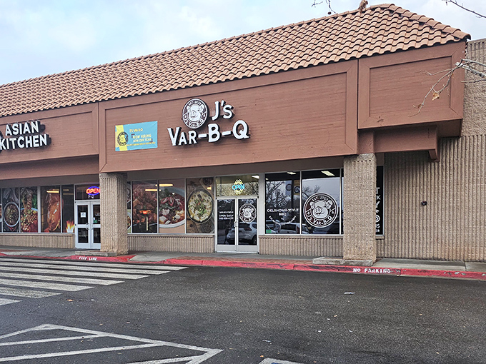 J's Var-B-Q announces itself with modest confidence from its strip mall home. Like all true barbecue legends, it knows great smoked meat needs no fancy facade.