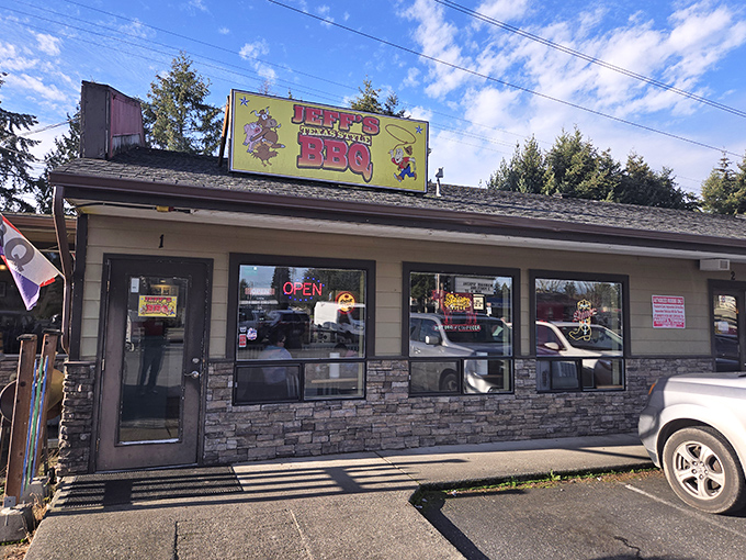 The bright yellow sign beckons like a smoky siren call to barbecue pilgrims. This unassuming Marysville storefront houses meat magic that would make a Texan weep with joy.