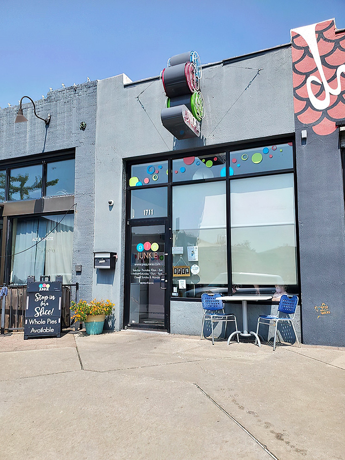 The colorful Pie Junkie storefront beckons like a siren song to dessert lovers. That sign isn't just advertising&mdash;it's a promise of happiness.