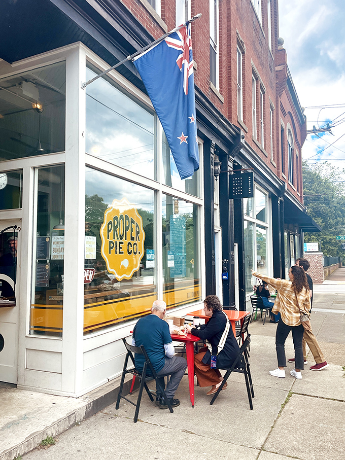 The iconic blue door and bright yellow logo of Proper Pie Co. stand out like a beacon for pastry pilgrims on Richmond's East Broad Street.