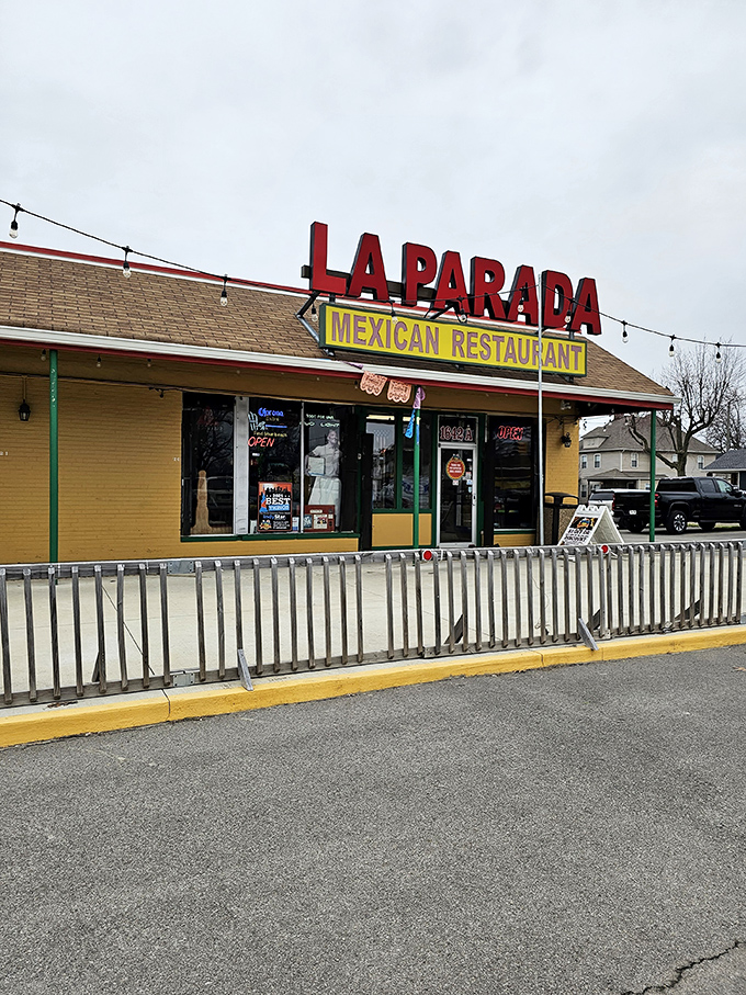 The bright red "LA PARADA" sign beckons like a lighthouse for hungry souls. This unassuming exterior houses flavor explosions that would make Guy Fieri need a new vocabulary.