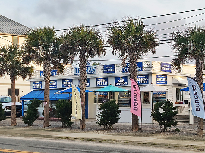 The white beachside shack beckons like a mirage. Blue signs promising kolaches and scratch-made biscuits are the only warning of the deliciousness ahead.