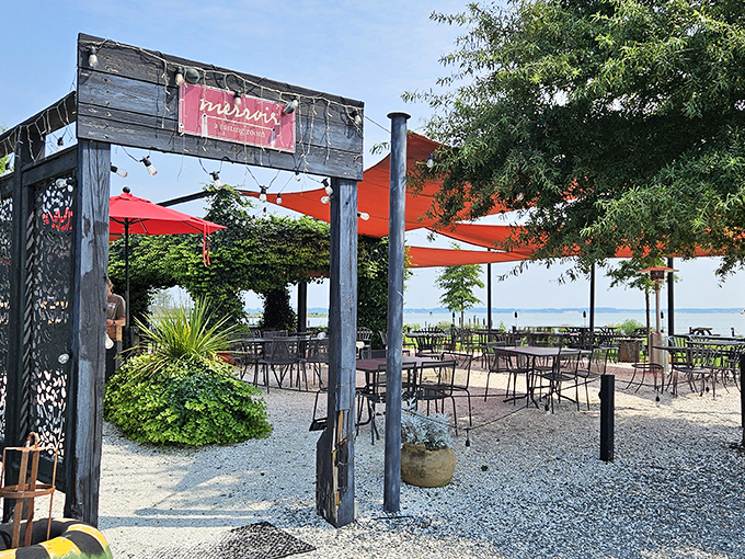 The entrance to seafood paradise - a humble wooden structure with bright orange awnings where Chesapeake Bay magic happens daily.