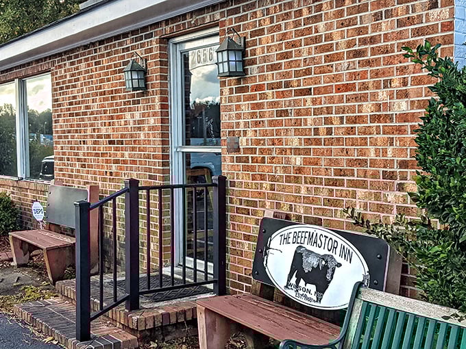 The unassuming exterior hides culinary greatness like a superhero's secret identity. Hungry pilgrims gather outside, knowing what awaits. 