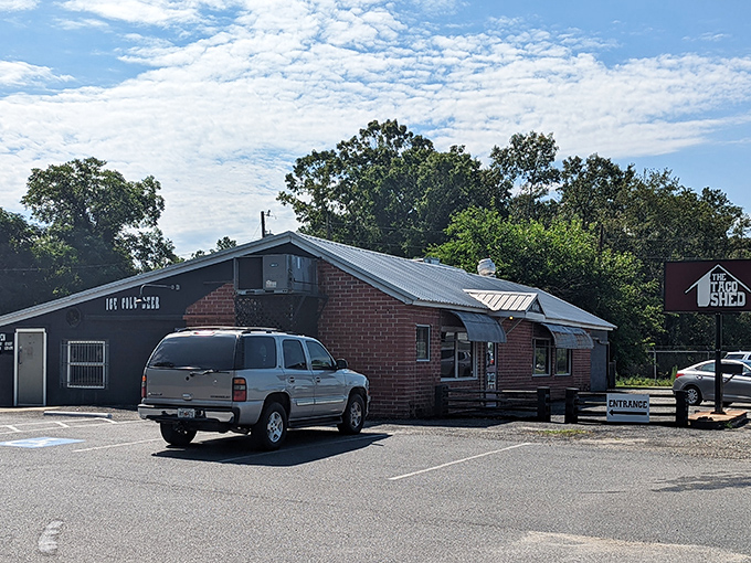 Morning sunshine meets brick-and-mortar simplicity at The Taco Shed. This unassuming Warner Robins landmark proves great breakfasts don't need fancy facades.
