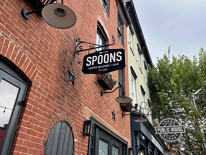 Spoons' classic brick exterior with its understated sign promises culinary treasures within. Federal Hill's breakfast landmark has been drawing crowds since 1999.