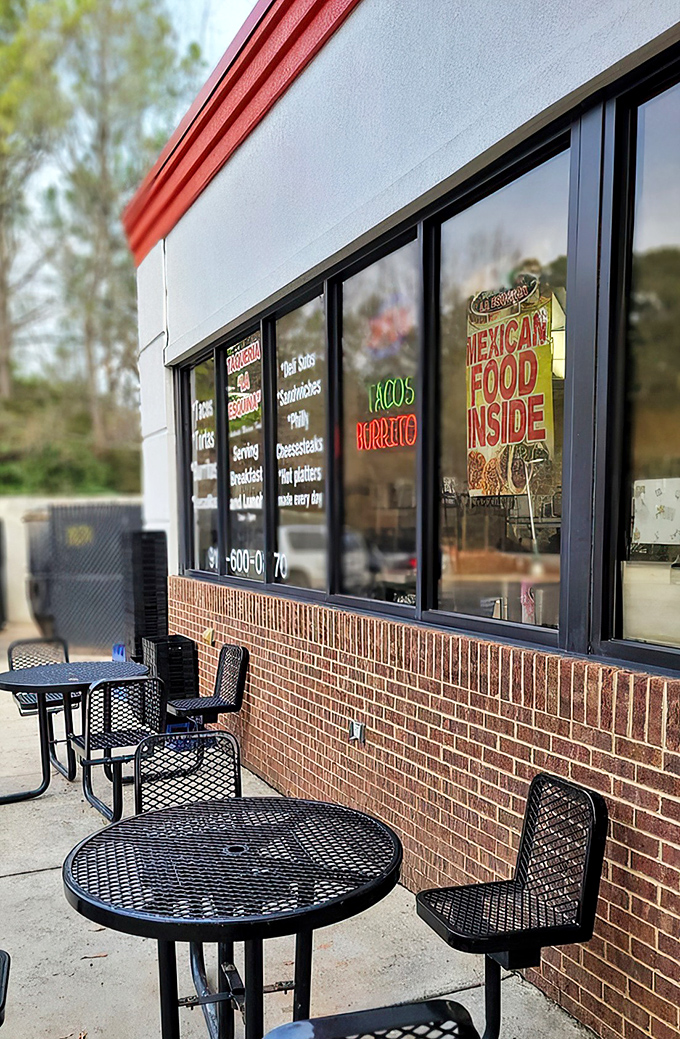 The modest storefront speaks the universal language of good food with its straightforward window signage: TACOS, BURRITOS, MEXICAN FOOD INSIDE. No fancy frills needed.
