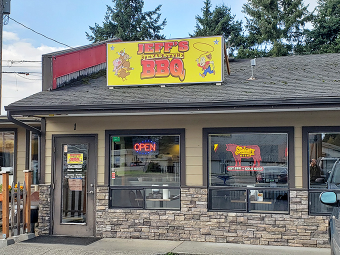 The bright yellow sign beckons like a smoky siren call to barbecue pilgrims. This unassuming Marysville storefront houses meat magic that would make a Texan weep with joy.
