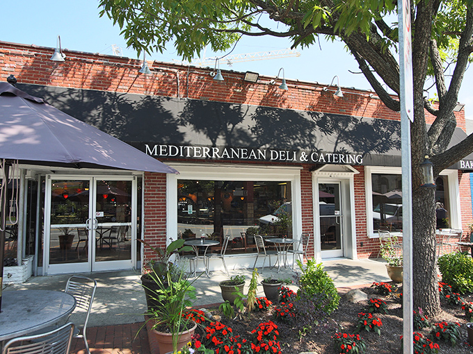 A humble brick storefront that holds more culinary treasures than your grandmother's secret recipe box. Mediterranean Deli's exterior promises authentic flavors within.