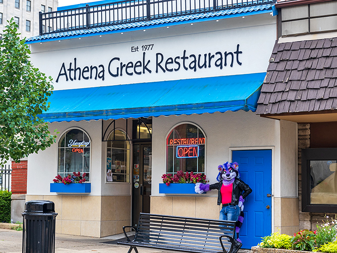 The blue-and-white fa&ccedil;ade of Athena Greek Restaurant stands like a Mediterranean oasis in downtown Mansfield, promising authentic flavors and hometown hospitality.