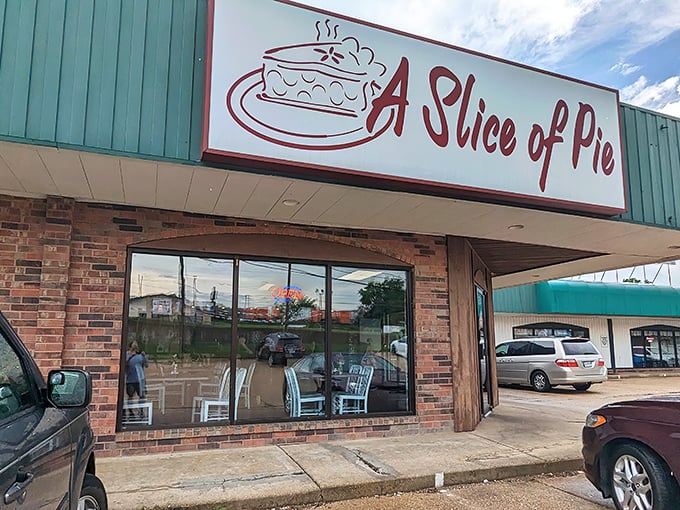The neon glow of pie paradise beckons from this unassuming corner spot. After dark, it's Rolla's dessert lighthouse guiding sugar-seekers home.