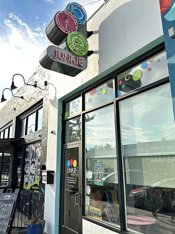 The colorful Pie Junkie storefront beckons like a siren song to dessert lovers. That sign isn't just advertising&mdash;it's a promise of happiness.