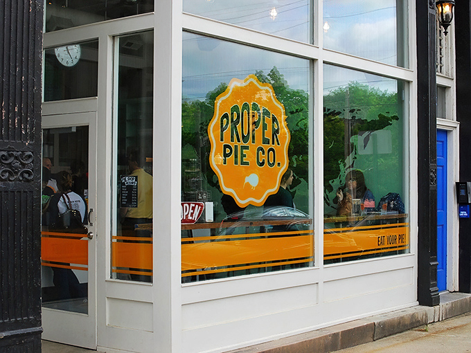 The iconic blue door and bright yellow logo of Proper Pie Co. stand out like a beacon for pastry pilgrims on Richmond's East Broad Street.
