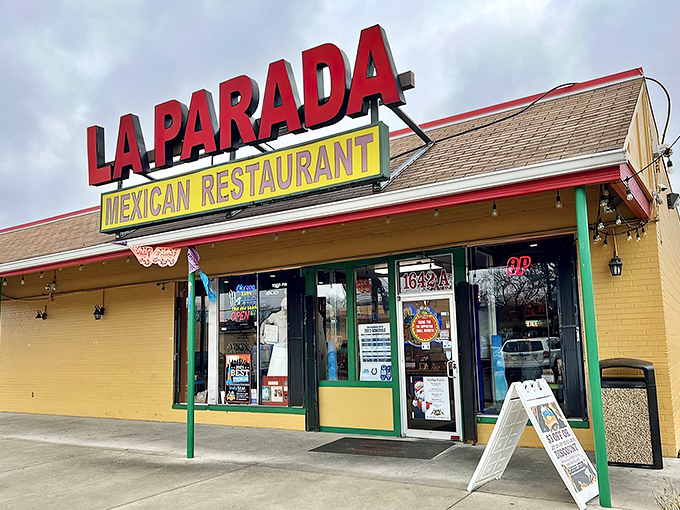The bright red "LA PARADA" sign beckons like a lighthouse for hungry souls. This unassuming exterior houses flavor explosions that would make Guy Fieri need a new vocabulary.
