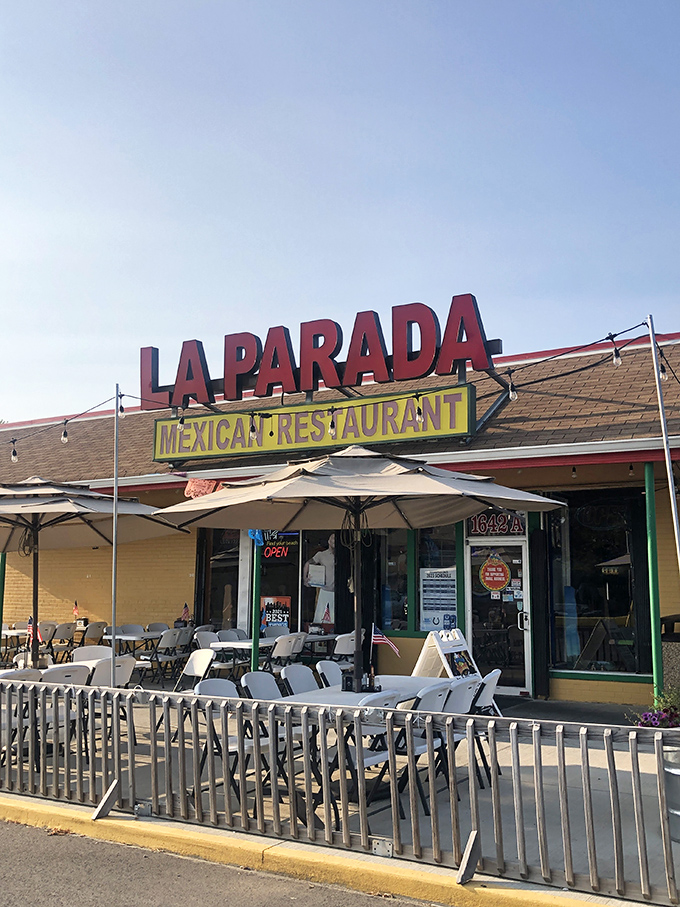 The bright red "LA PARADA" sign beckons like a lighthouse for hungry souls. This unassuming exterior houses flavor explosions that would make Guy Fieri need a new vocabulary.