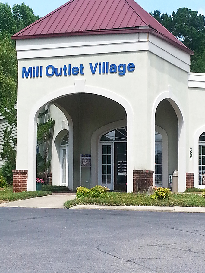 The inviting arched entrance of Mill Outlet Village promises fabric treasures within, like the wardrobe to Narnia for crafters.