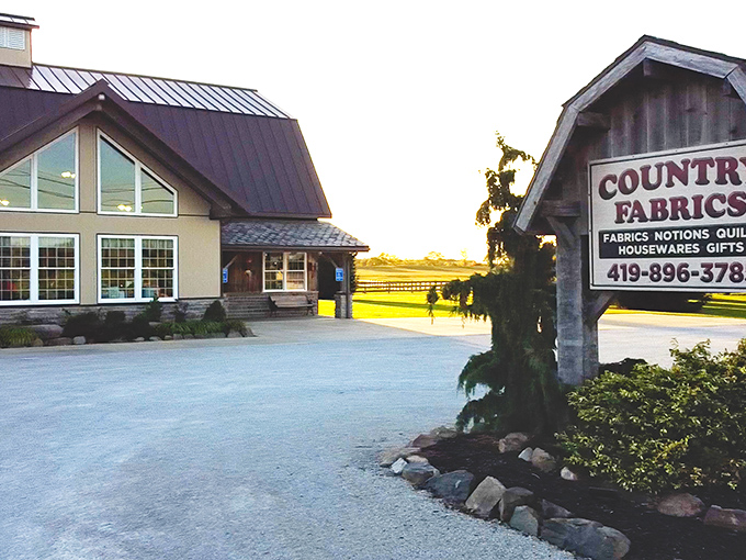 The modern barn-inspired exterior of Country Fabrics stands proudly against Ohio's countryside, promising textile treasures within its welcoming walls.