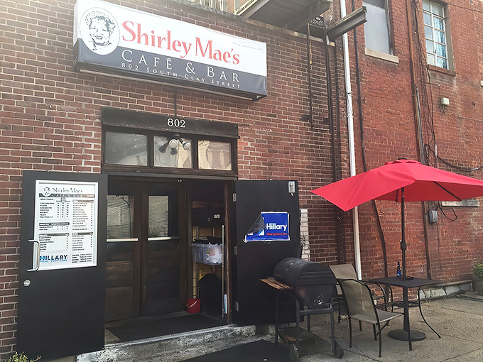 The unassuming brick exterior of Shirley Mae's Cafe hides culinary treasures that would make even the most jaded food critic weep with joy.