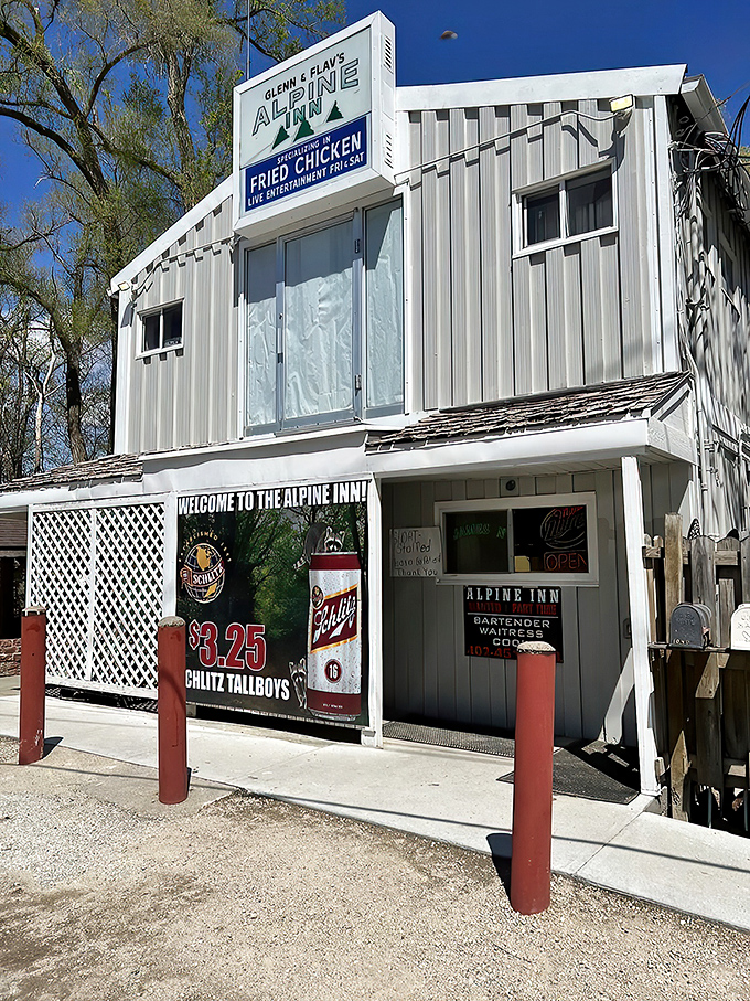 The bright turquoise exterior of Alpine Inn stands like a beacon of comfort food in northeast Omaha, promising fried chicken worth the journey.