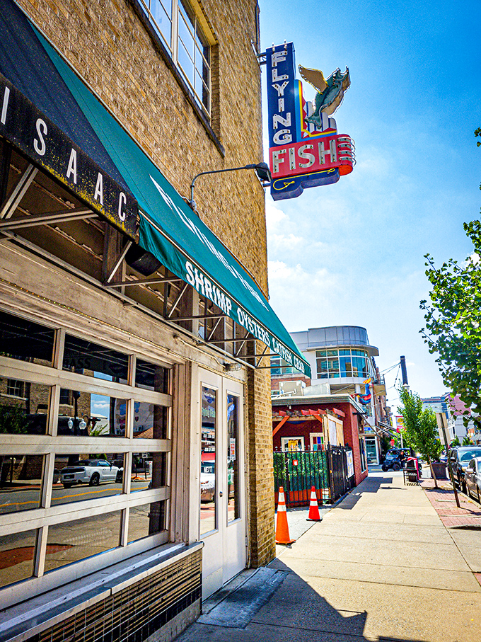 The green awning beckons like a seafood siren song. Flying Fish's no-nonsense exterior promises what fancy restaurants often forget: incredible food without the fuss.