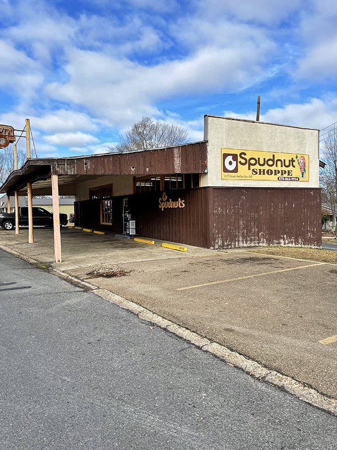 The weathered sign and modest exterior hide a temple of donut perfection that's been an El Dorado institution for generations.